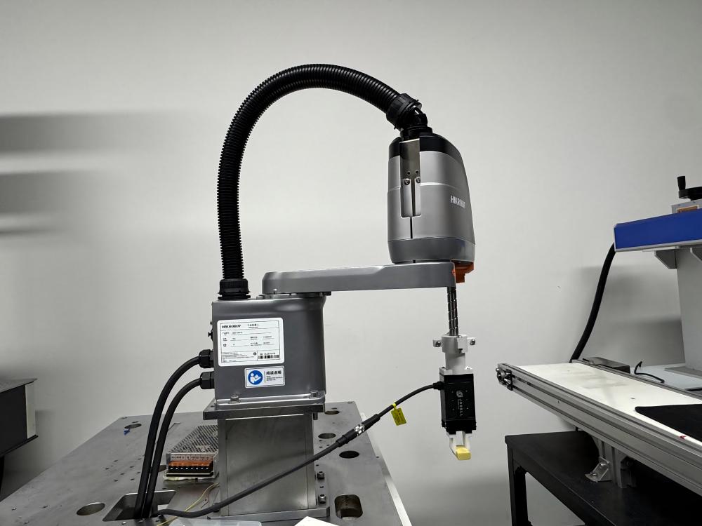 From "Seeing" to "Executing": Vision-Assisted Four-Axis Robotic Arm