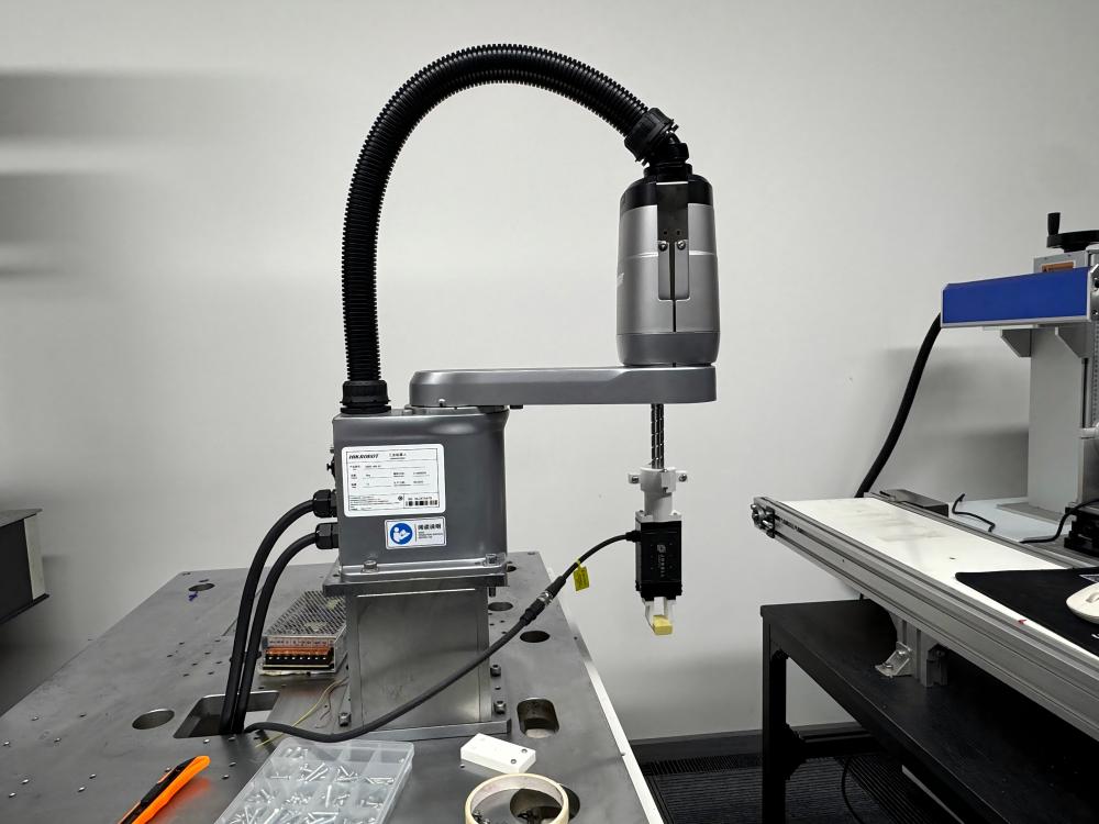 From "Seeing" to "Executing": Vision-Assisted Four-Axis Robotic Arm